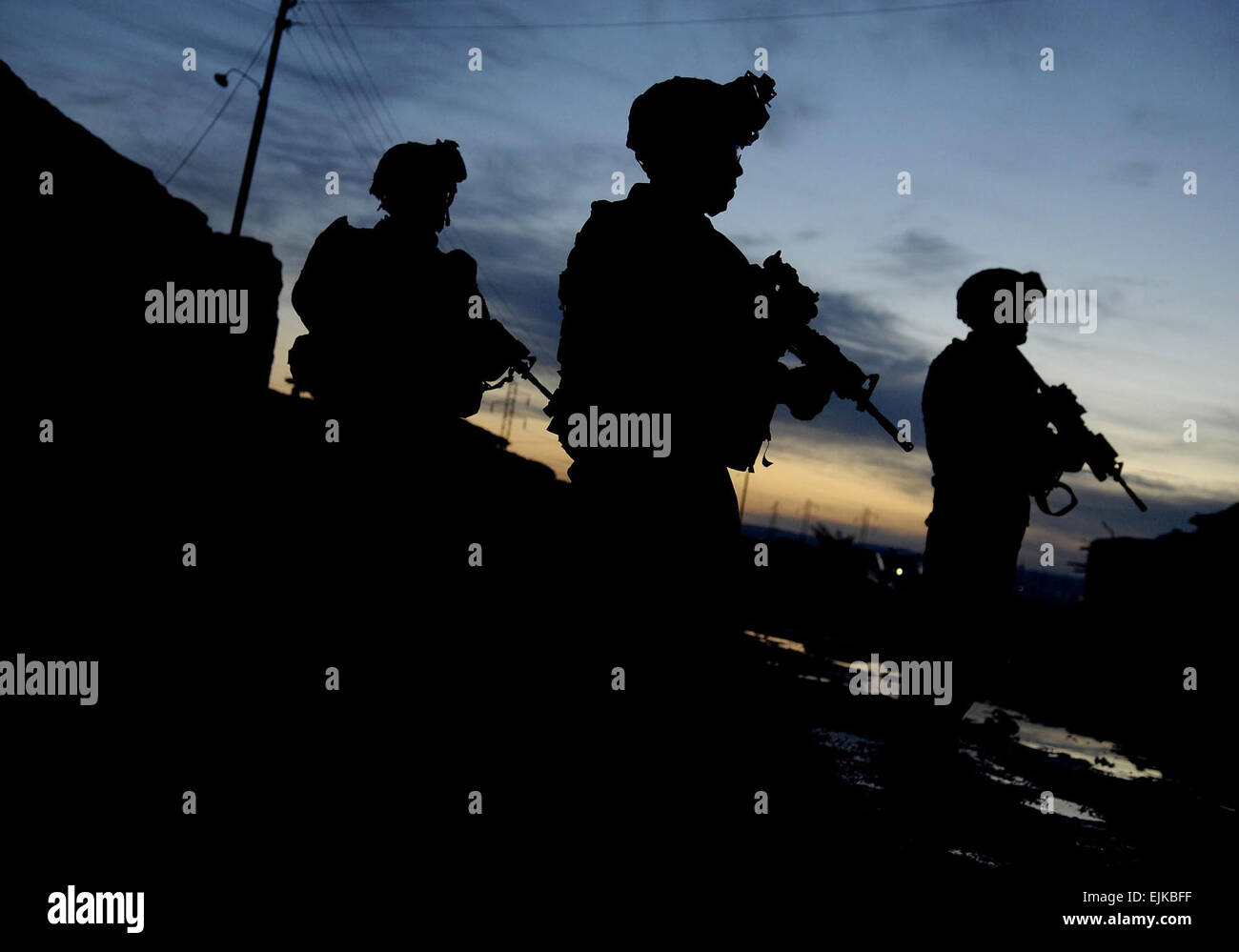 U.S. Army Soldiers provide an outer cordon of the village as Iraqi ...
