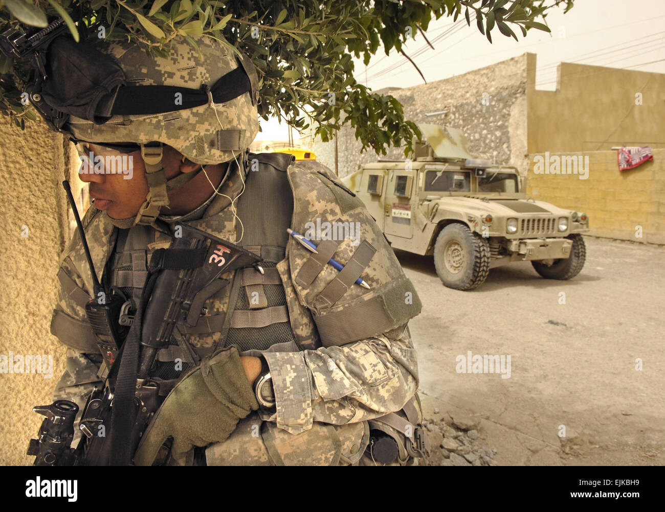A U.S. Army soldier provides perimeter security during an Iraqi police ...