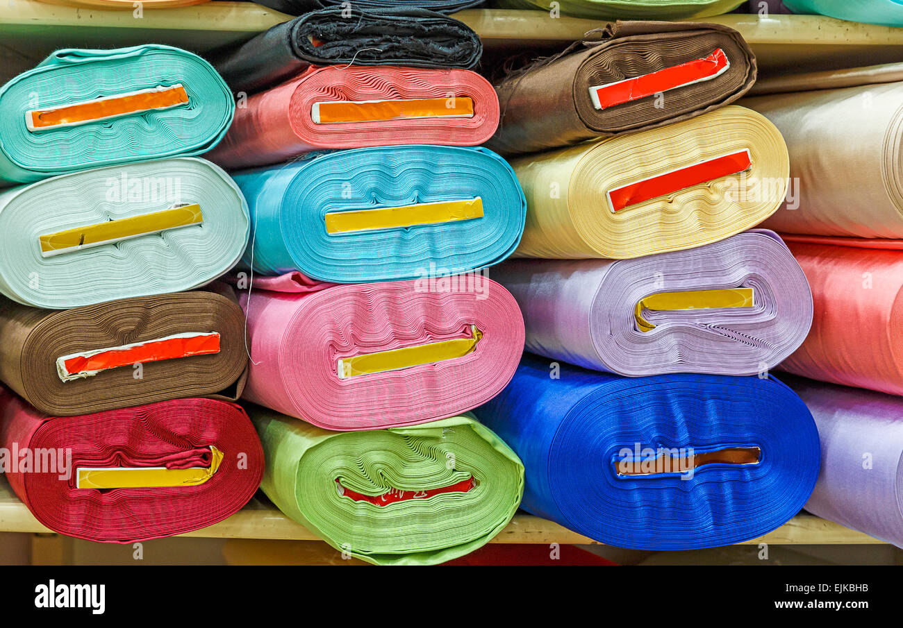 Rolls of colored fabrics Stock Photo - Alamy
