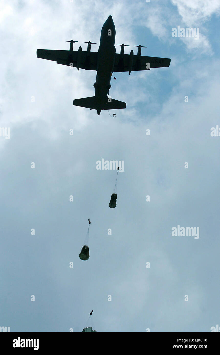 Paratroopers with the XVIII Airborne Corps exit a C-130 Hercules ...