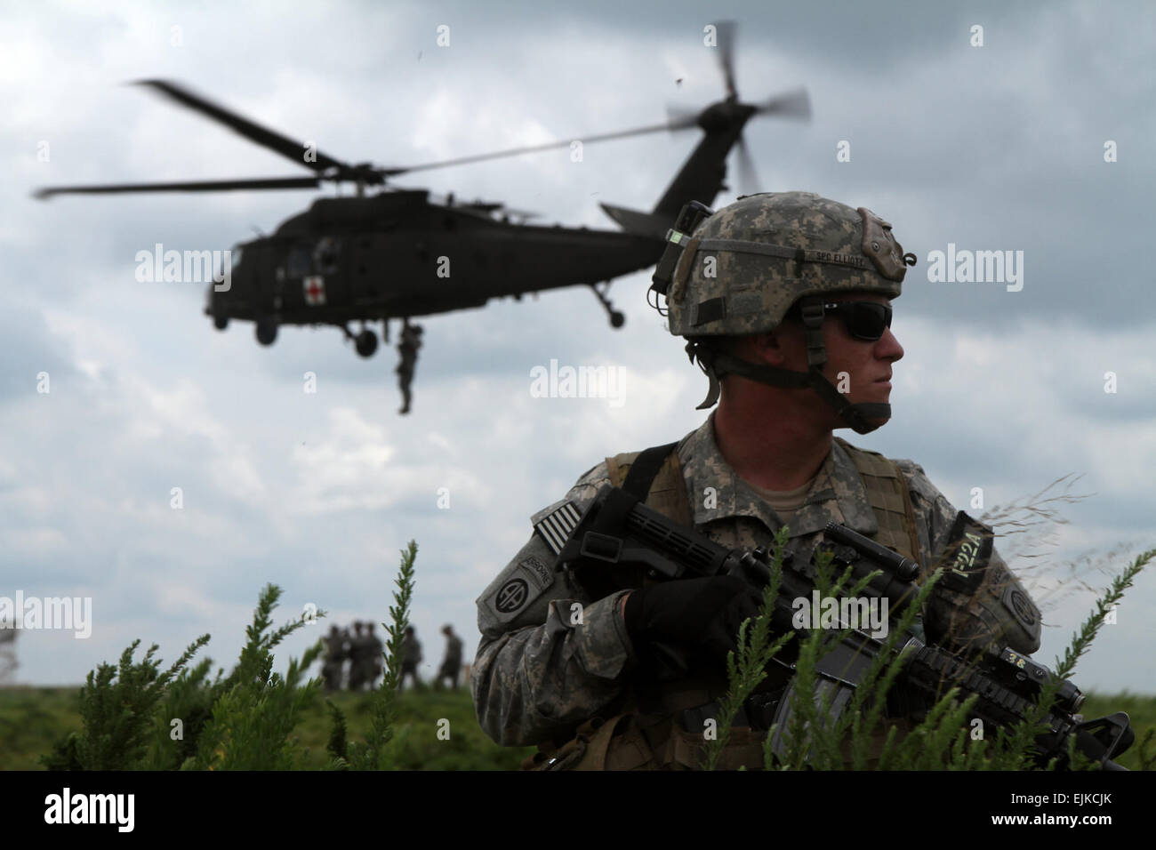 A Soldier pulls security while medics with 1-319th Airborne Field ...