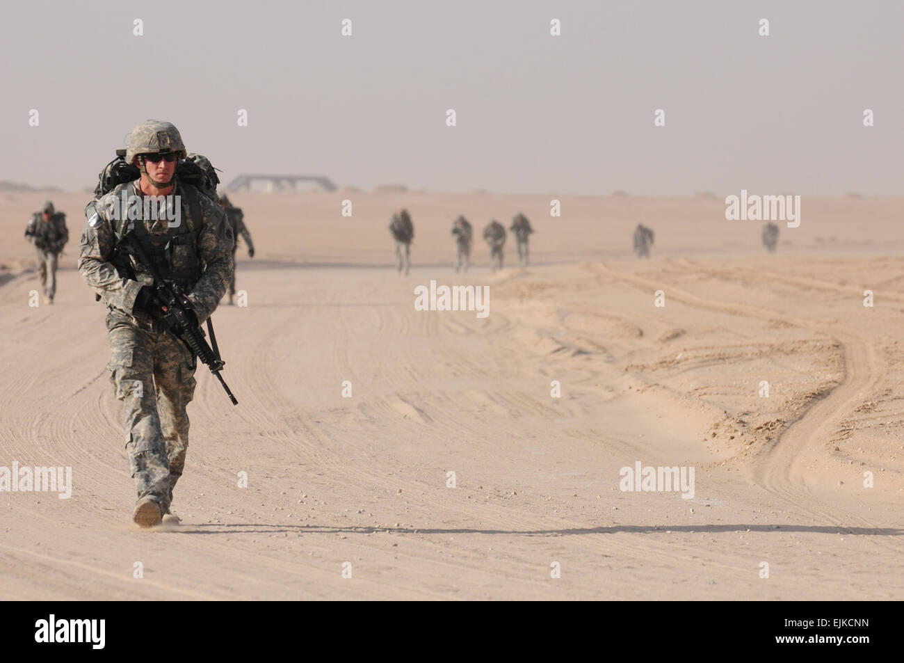 Soldiers from the Minnesota National Guard complete a ruck march to ...