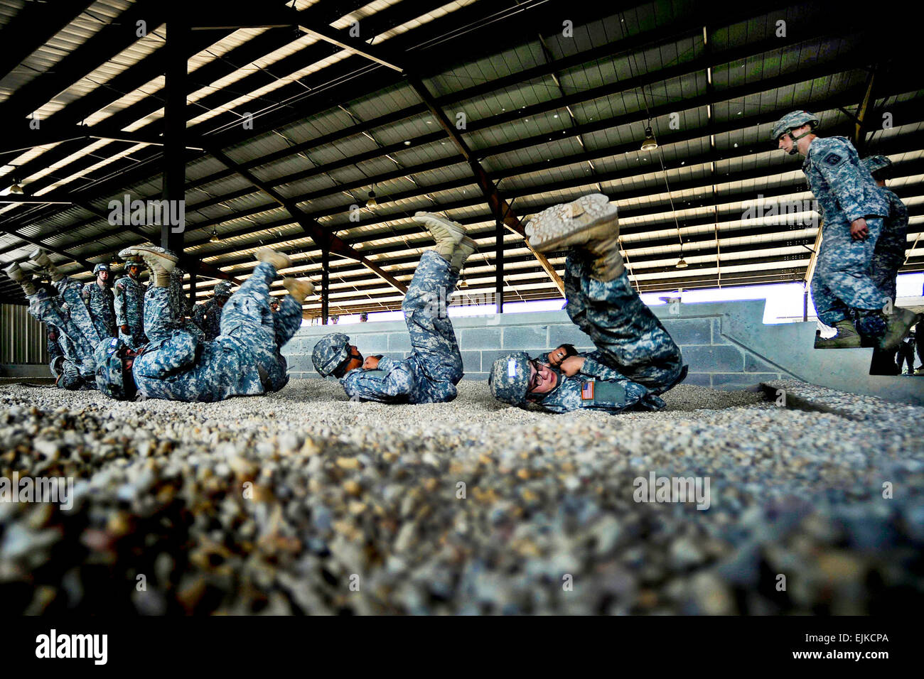 U.S. Army Soldiers conduct practice landing falls during a joint ...