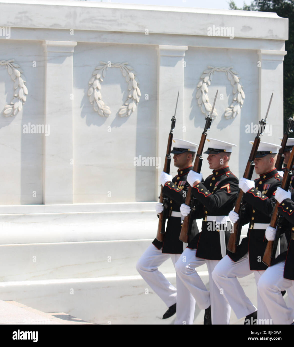 Marines from a ceremonial unit march up the stairs at the Tomb of the ...