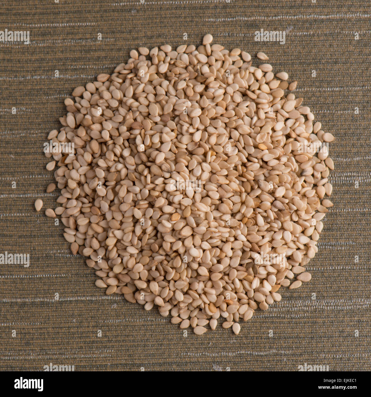 Top view of sesame seeds against green vinyl background Stock Photo - Alamy