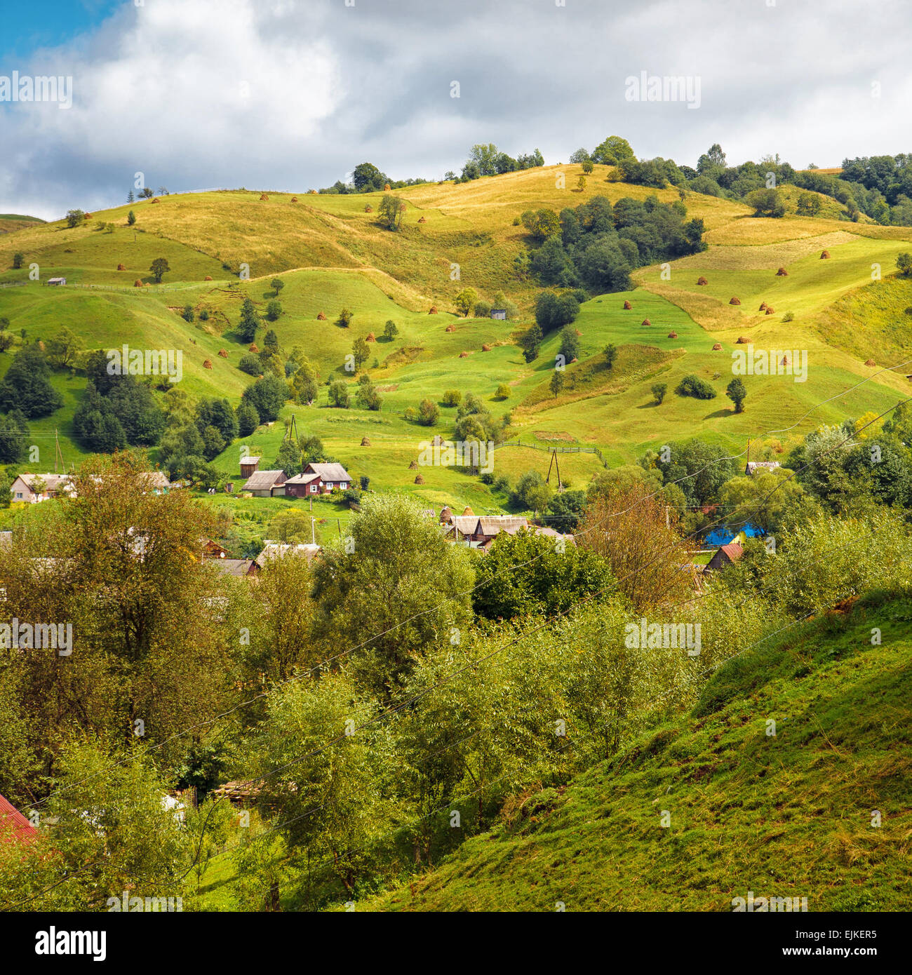 Little village in the mountains Stock Photo - Alamy