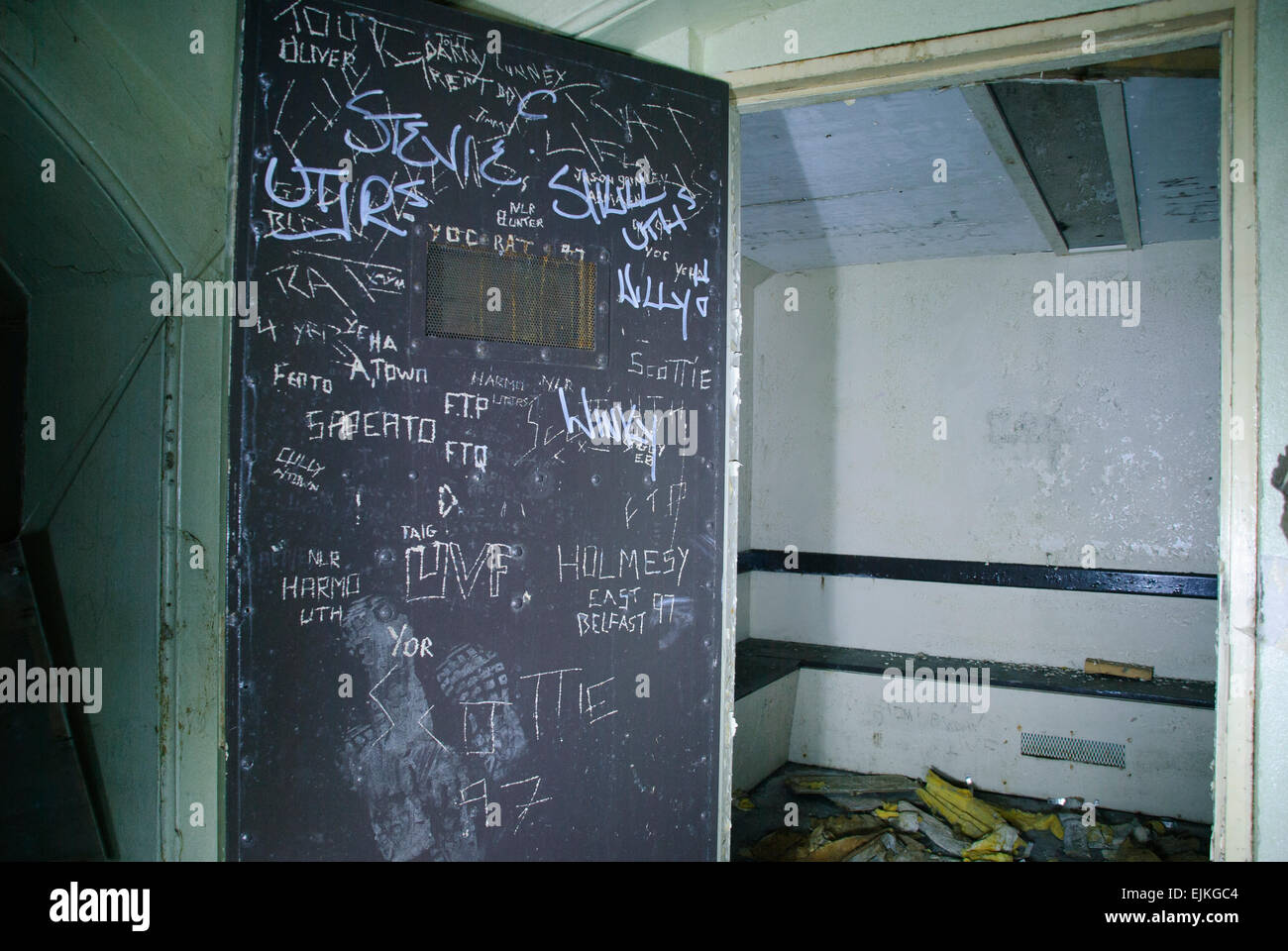 Graffiti on the inside of a prison holding cell Stock Photo - Alamy