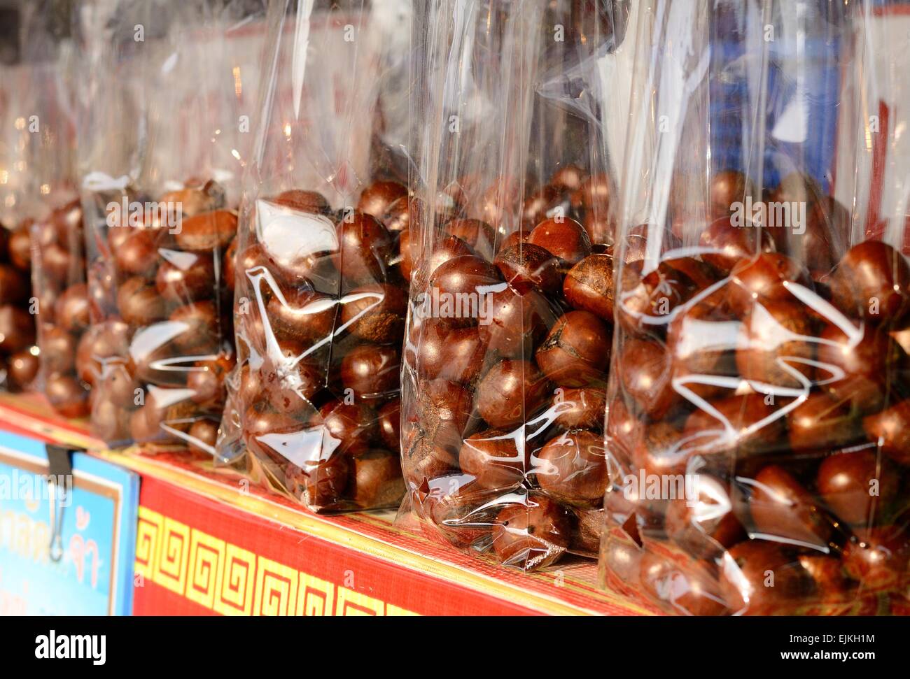 Thai style roasted chestnuts package in Thai market Stock Photo - Alamy