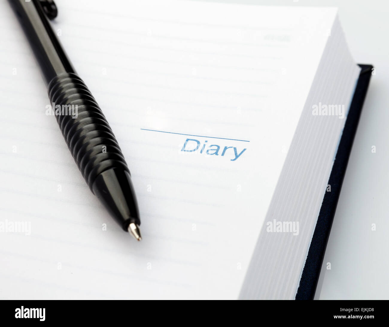 Open notebook with pen Stock Photo - Alamy