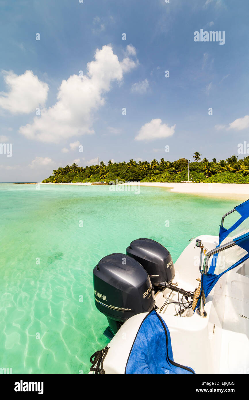 A Speed boat moored up at the jetty at Makunudu in the Maldives Stock ...