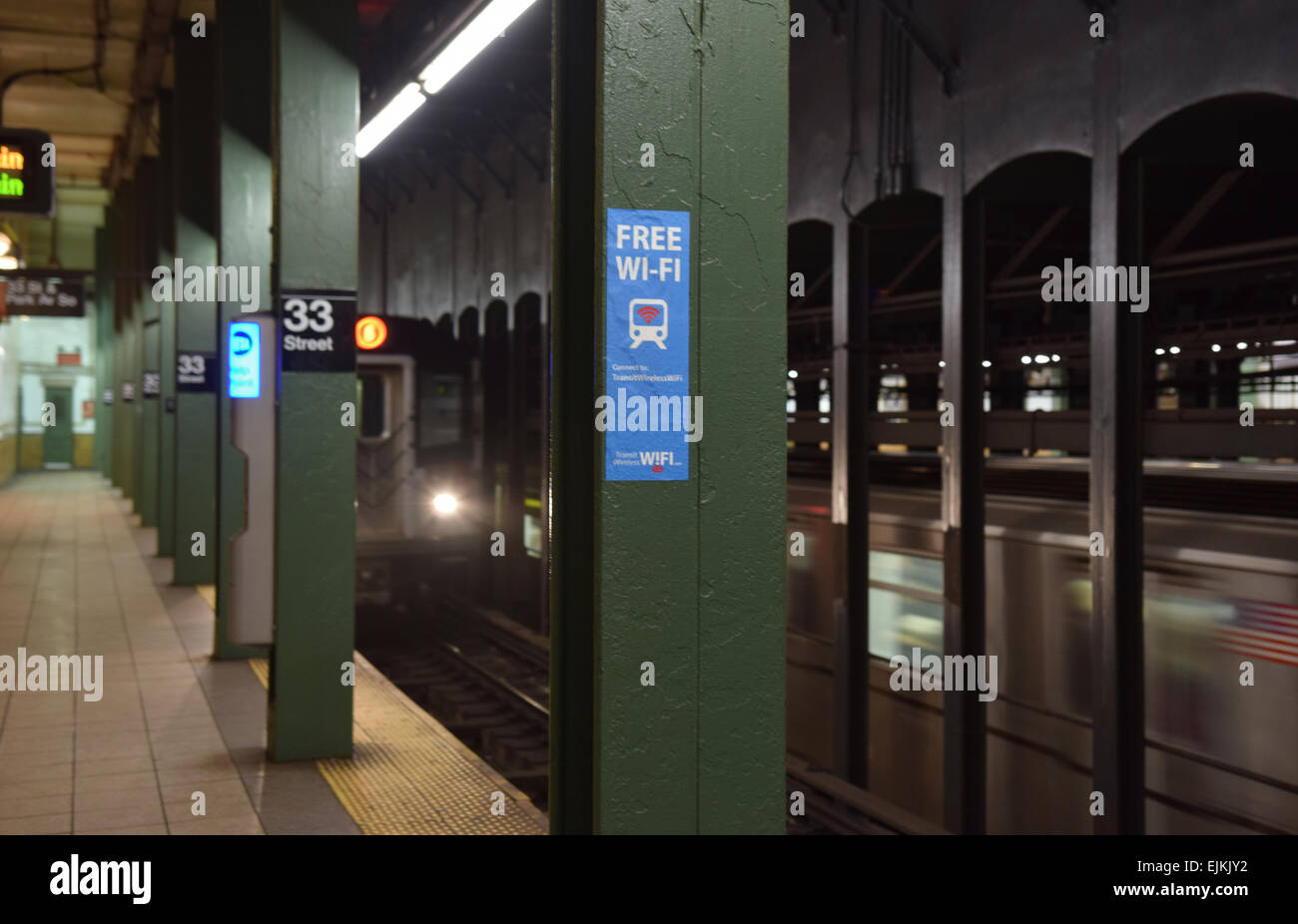 Sign at the East 33rd Street subway station on the #6 line announcing ...