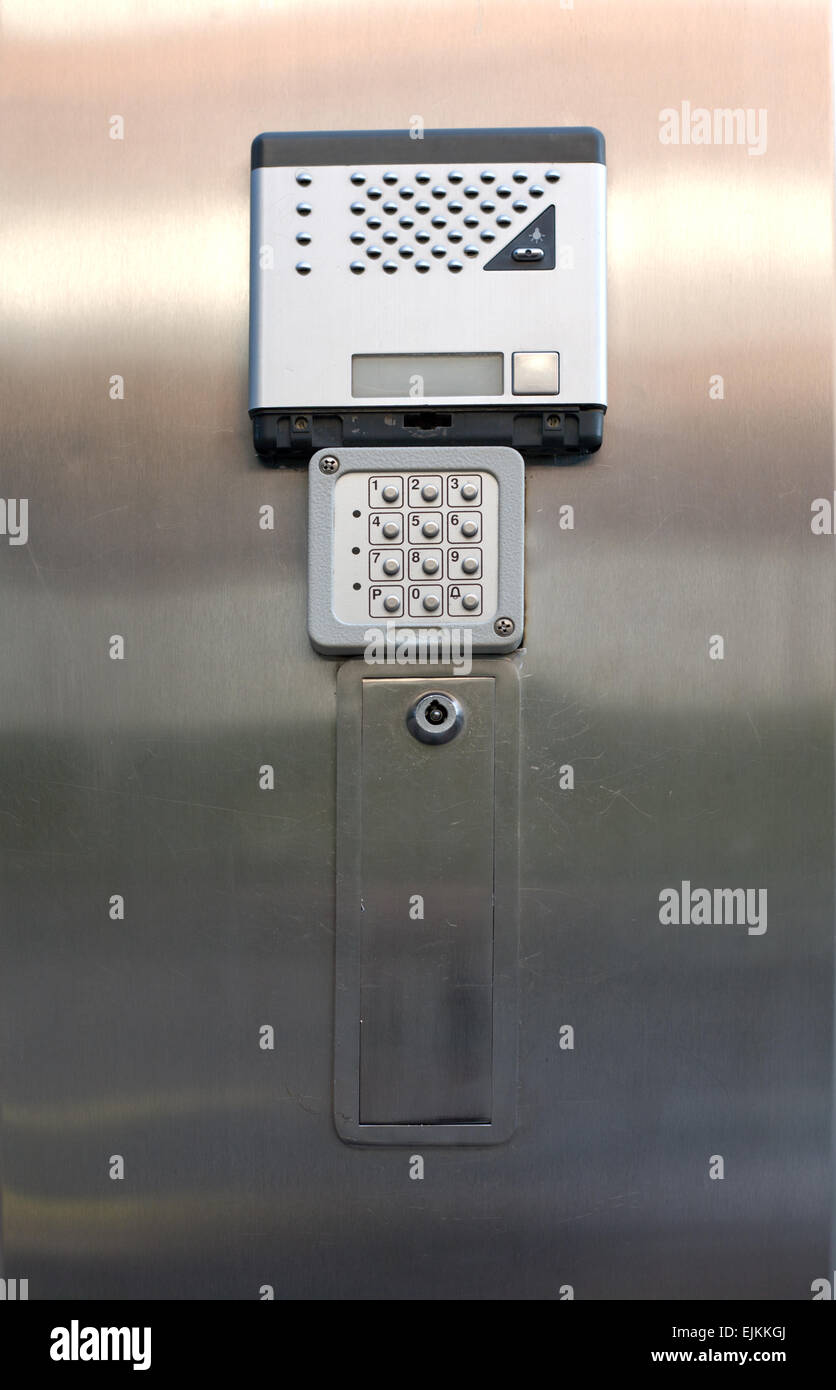 Alarm keypad and intercom isolated over metallic background Stock Photo ...