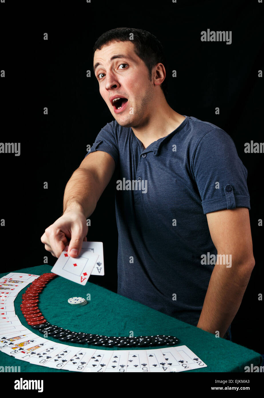 People playing poker table hi-res stock photography and images - Alamy