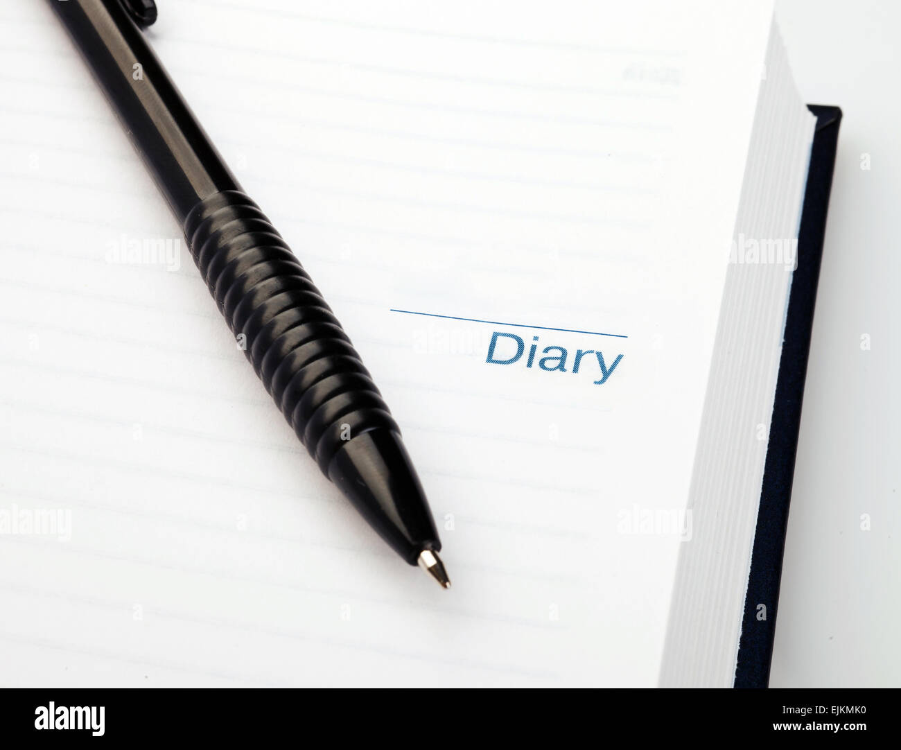 Open notebook with pen Stock Photo - Alamy
