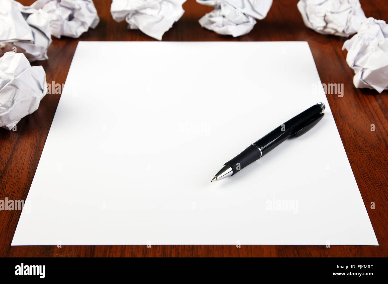 Blank paper with pen Stock Photo - Alamy