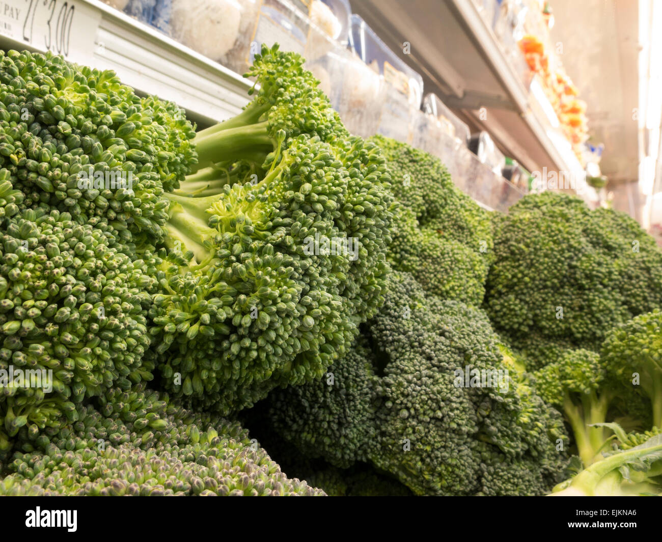 Pile of broccoli in a supermarket display case Stock Photo - Alamy