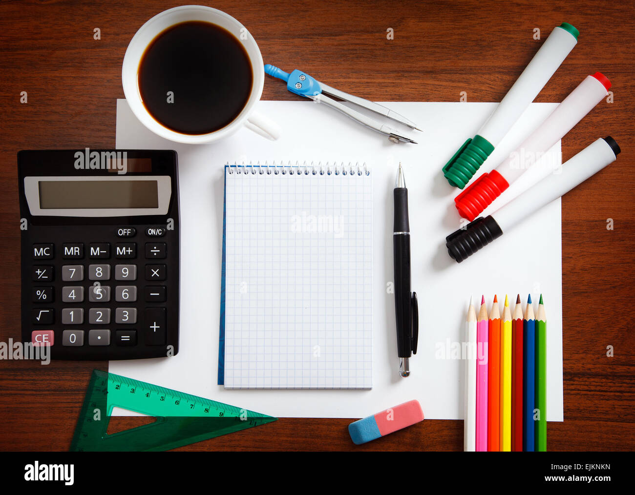 Desk with sheet of paper and stationery objects Stock Photo - Alamy
