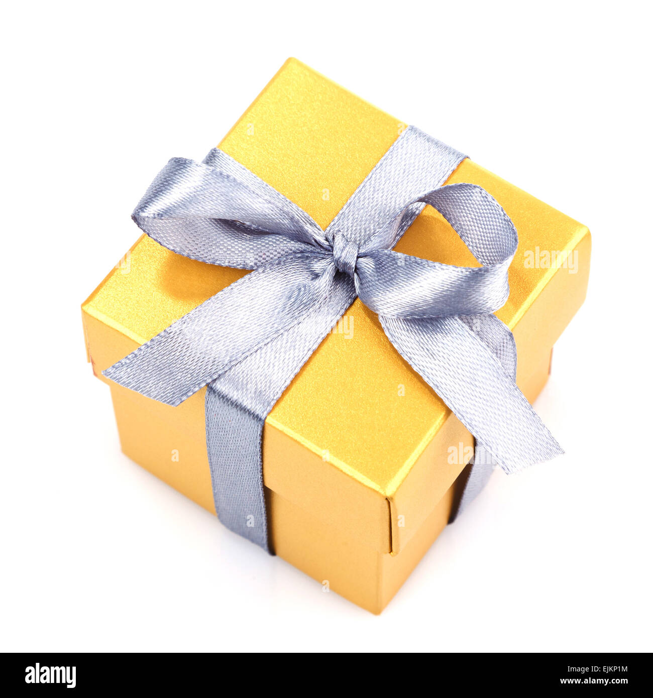 yellow gift box with silwer ribbon Stock Photo - Alamy