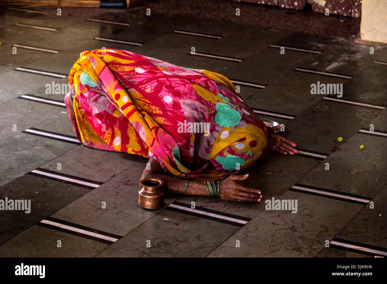 A woman bow to goddess in temple on the occassion of Last day of ...