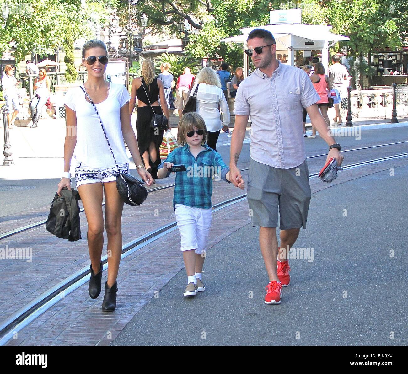 LA Galaxy captain, Robbie Keane with Claudine Palmer with their son ...