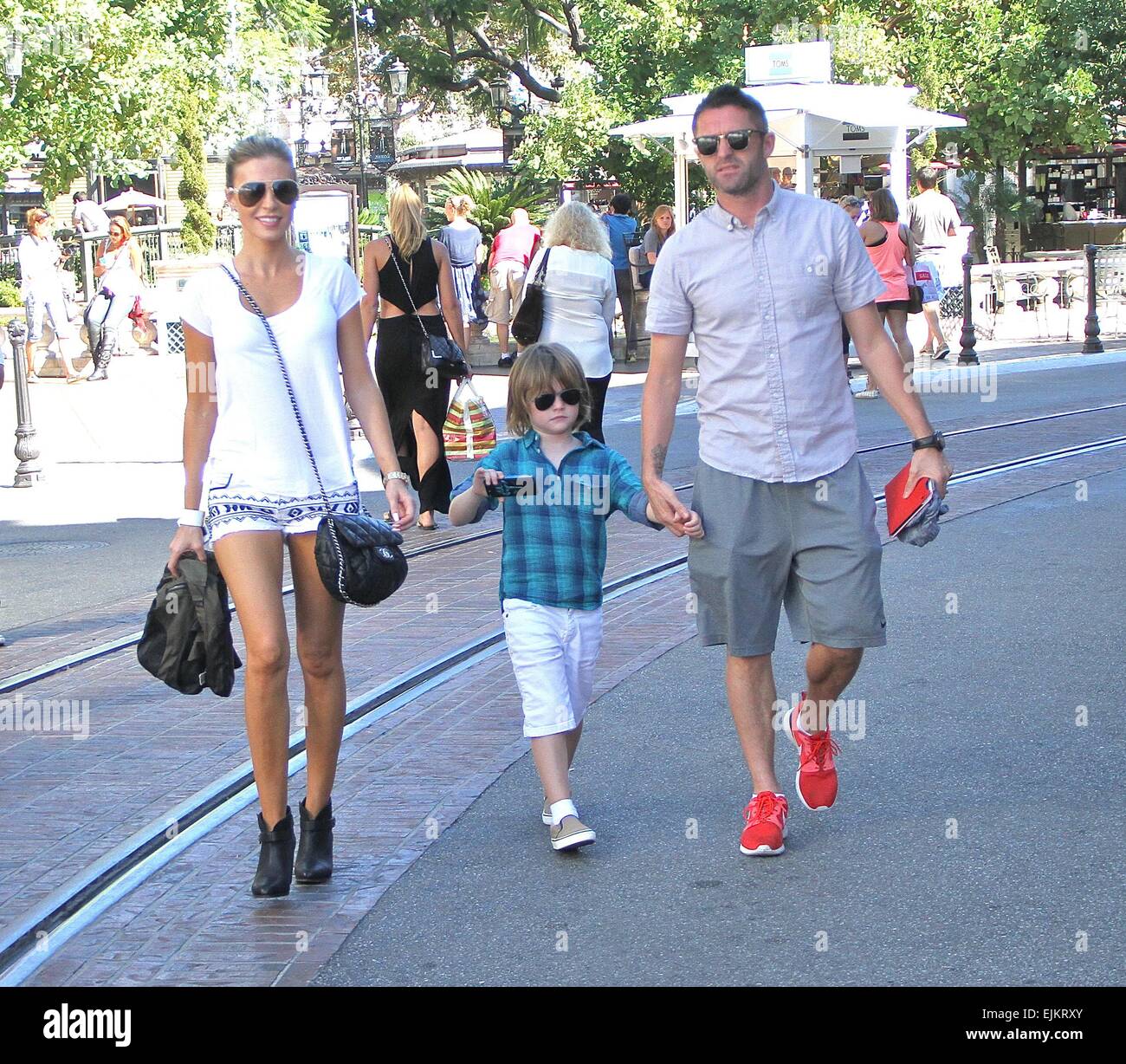 LA Galaxy captain, Robbie Keane with Claudine Palmer with their son ...