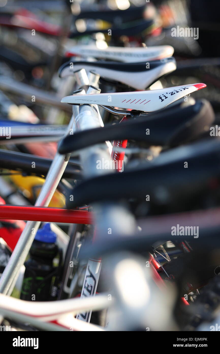 Bikes on stand at race Stock Photo - Alamy