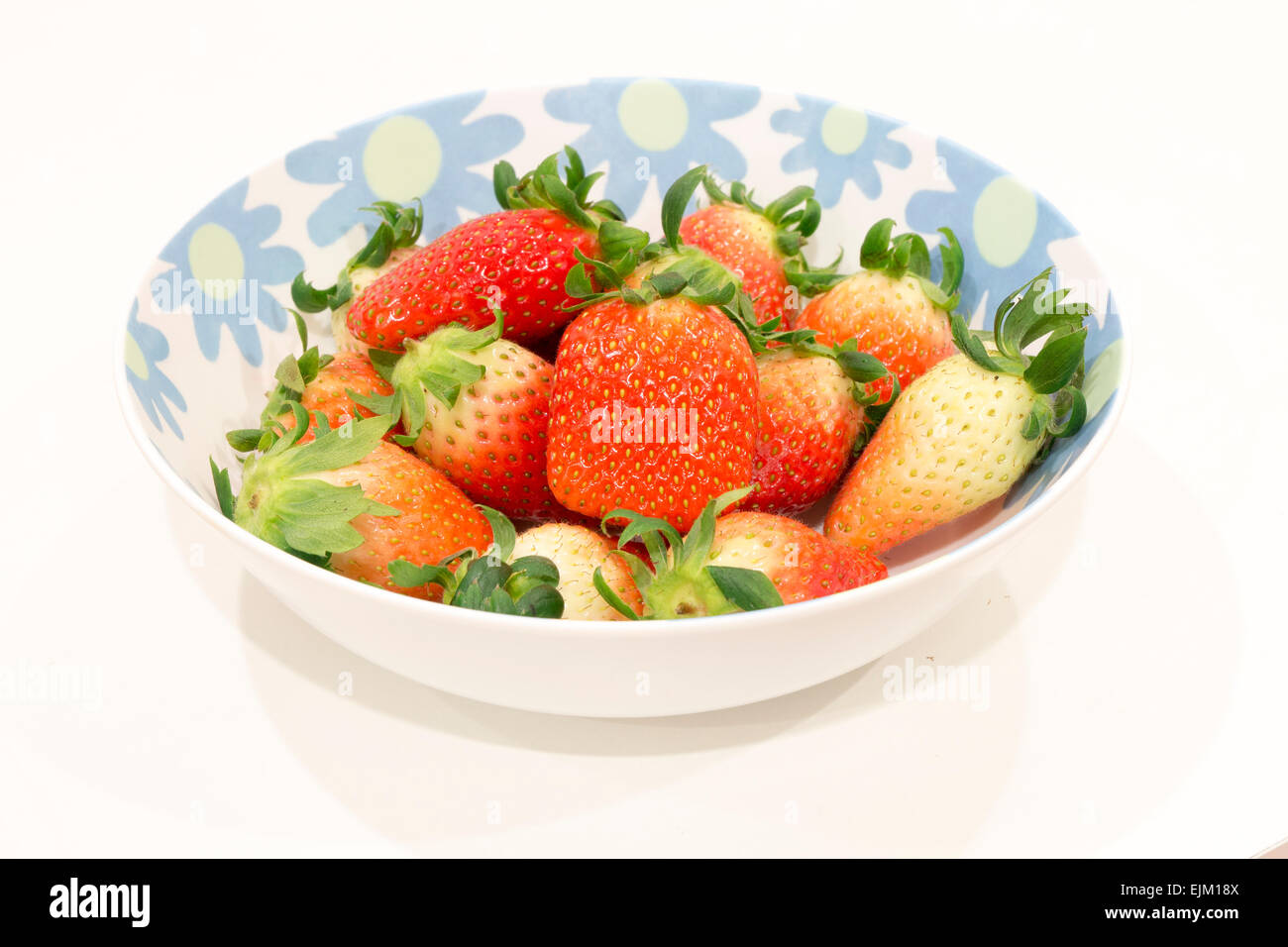 Fresh strawberry in bowl isolated on white background Stock Photo - Alamy