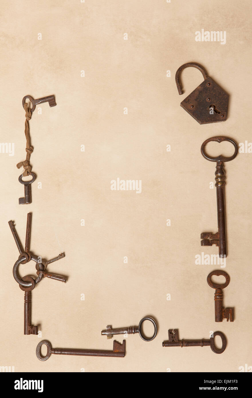 Rusty keys forming a border with copy space Stock Photo - Alamy