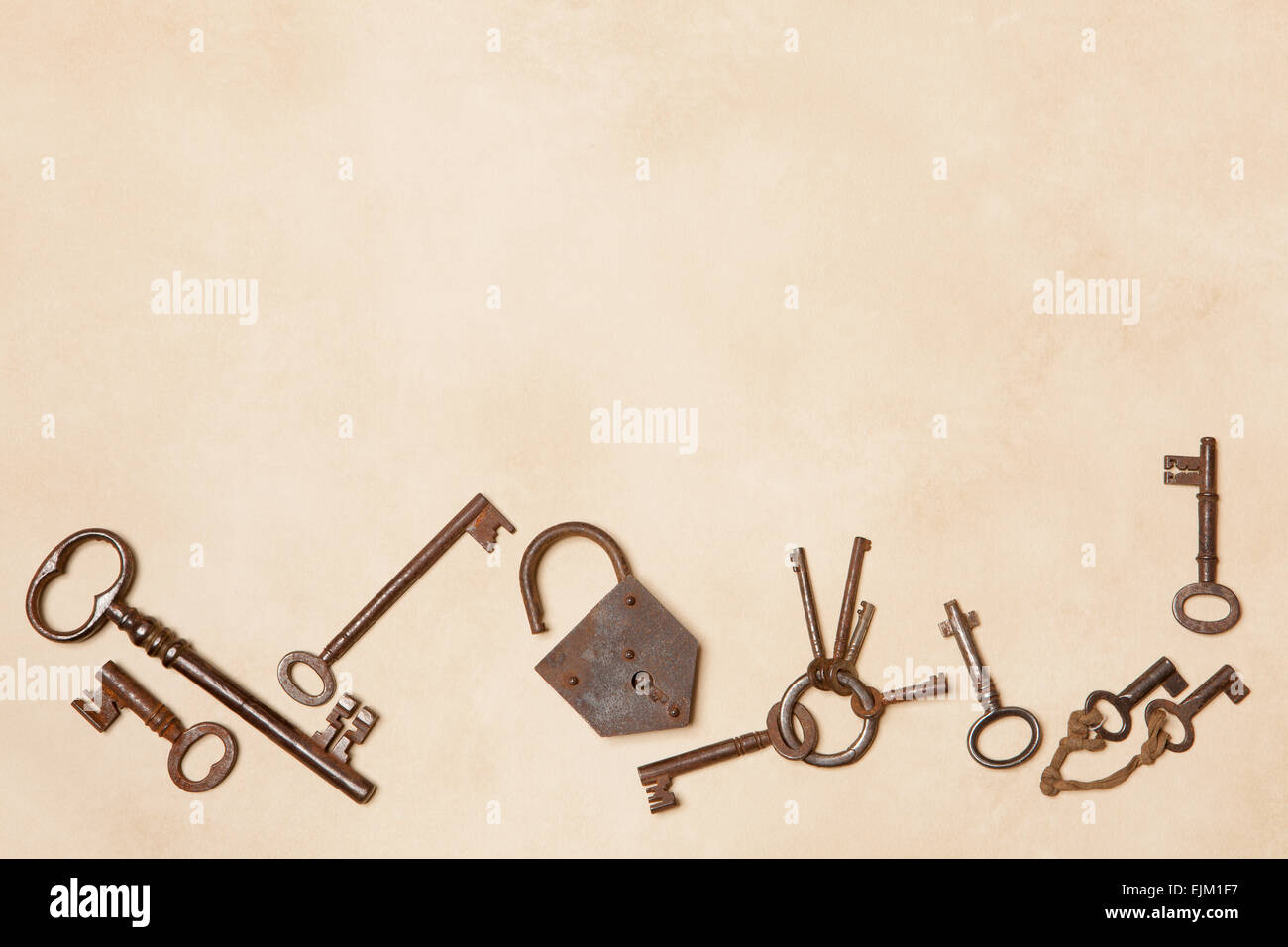 Border frame made of rusty keys and a padlock Stock Photo - Alamy