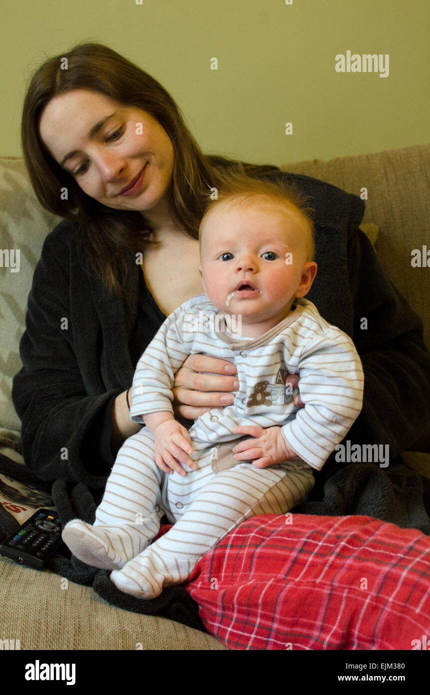 A three-month-old baby boy, dribbling from the mouth after being ...