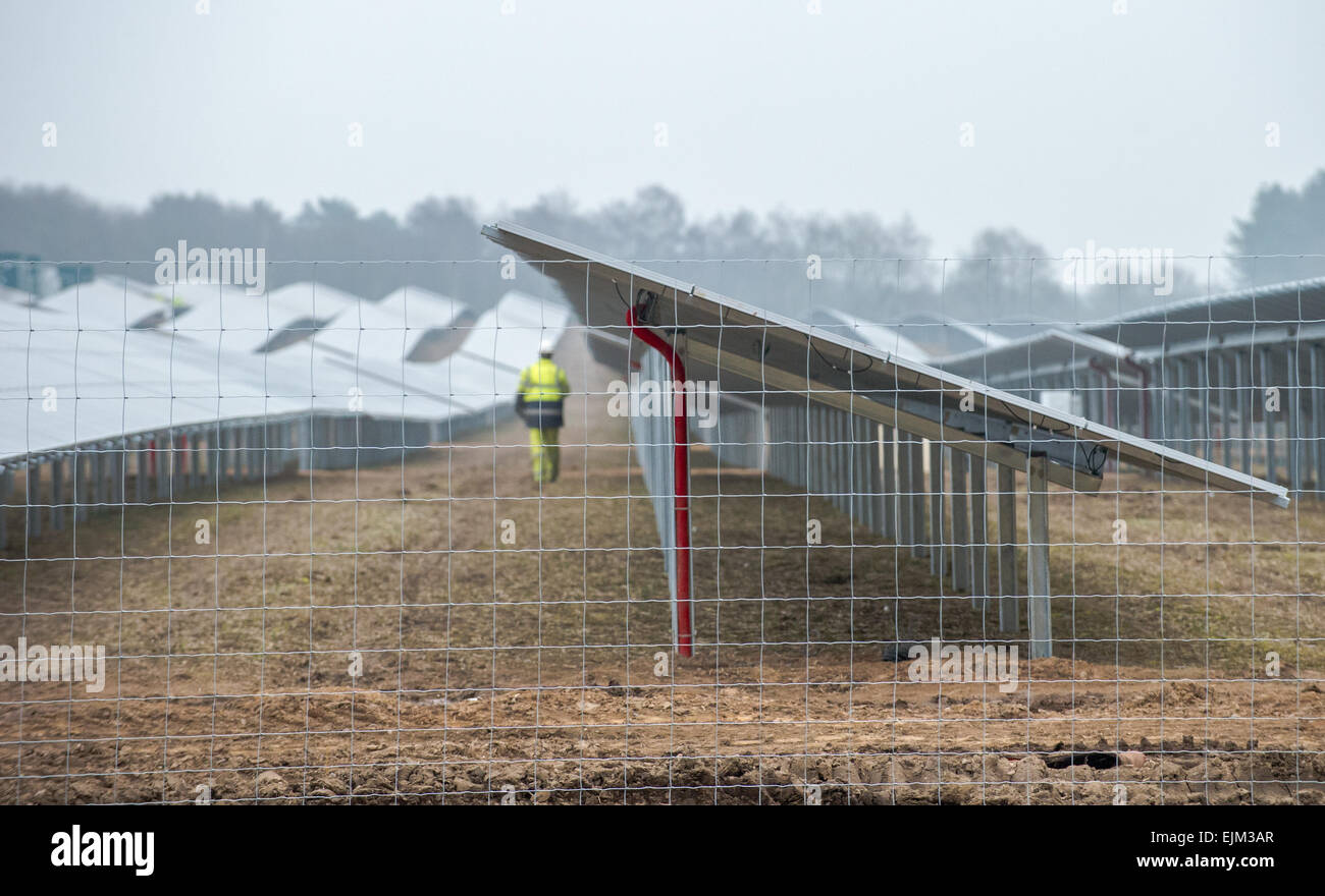 The installation of P.V. solar panels at a solar farm on the Welbeck ...