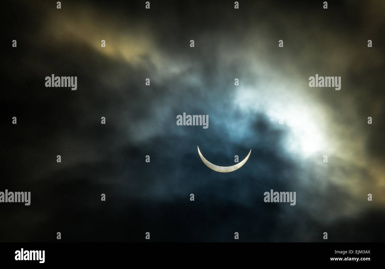 Partial solar eclipse of the Sun when the Moon passes between the Sun ...