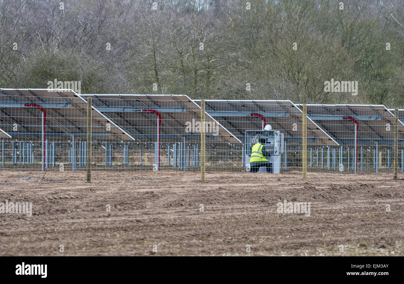 The installation of P.V. solar panels at a solar farm on the Welbeck ...