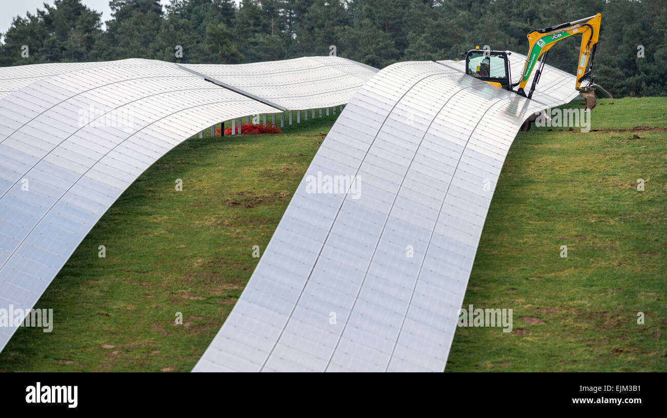 The installation of P.V. solar panels at a solar farm on the Welbeck ...