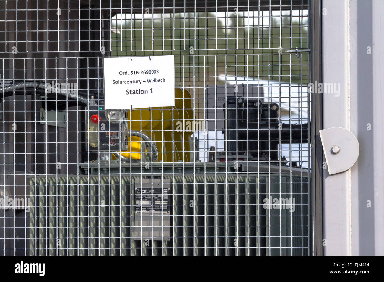 Caged high voltage transformer at a solar farm Stock Photo - Alamy