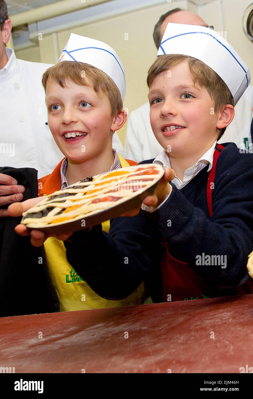 Belgian twins, Prince Nicolas and Prince Aymeric (R), visit a bakery in ...