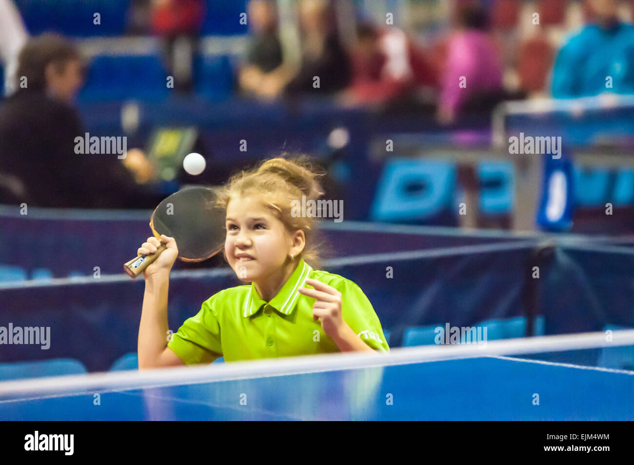 Cute girl playing table tennis hi-res stock photography and images - Alamy