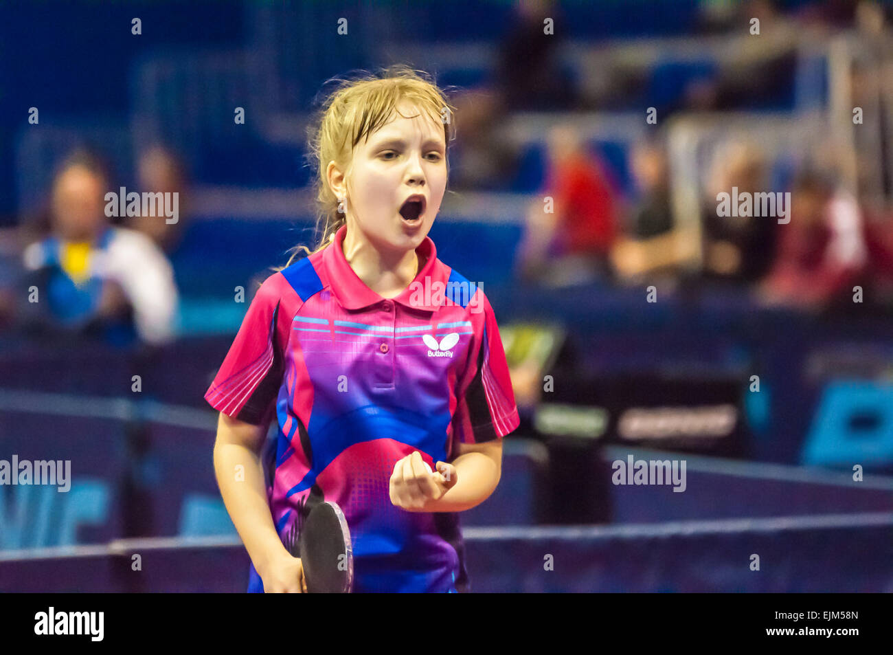 Cute girl playing table tennis hi-res stock photography and images - Alamy