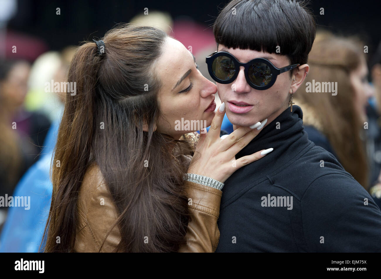 Fans of Lady Gaga, many in costume, wait outside the Ziggo Dome where ...