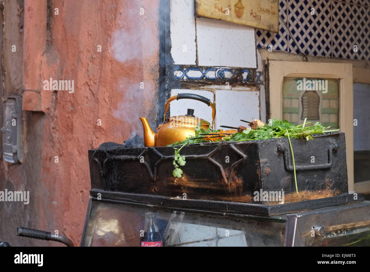 Kettle boiling on a barbeque in a Marrakech souk, Morocco, North Africa ...
