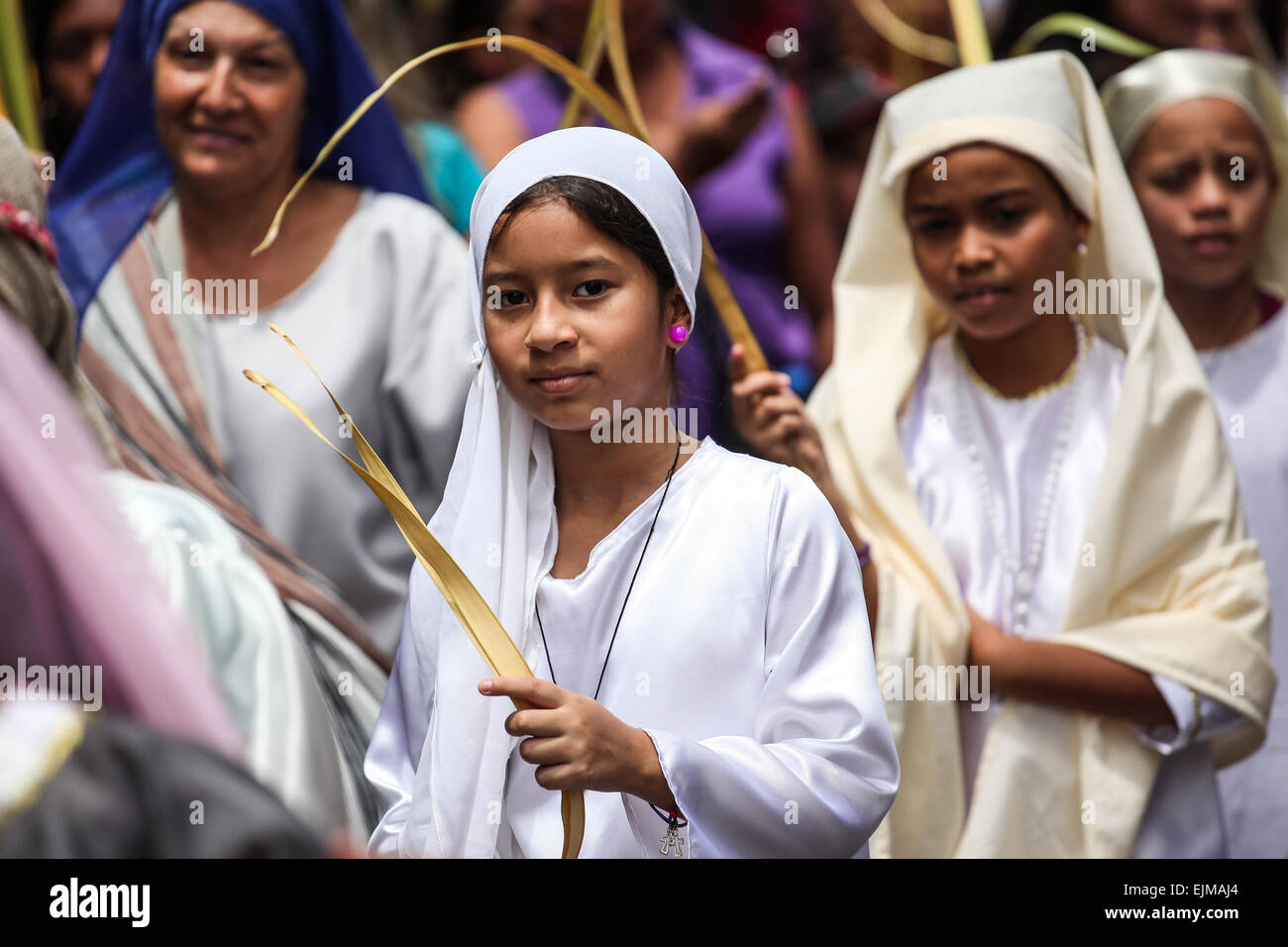 Caracas, Venezuela. 29th Mar, 2015. Women hold palms during a ...