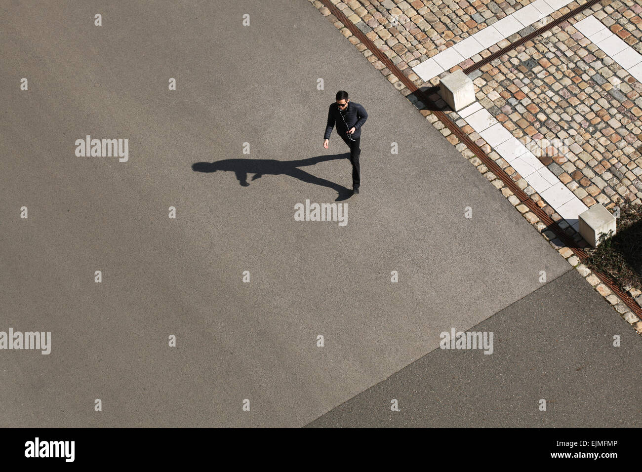Man walking aerial street hi-res stock photography and images - Alamy