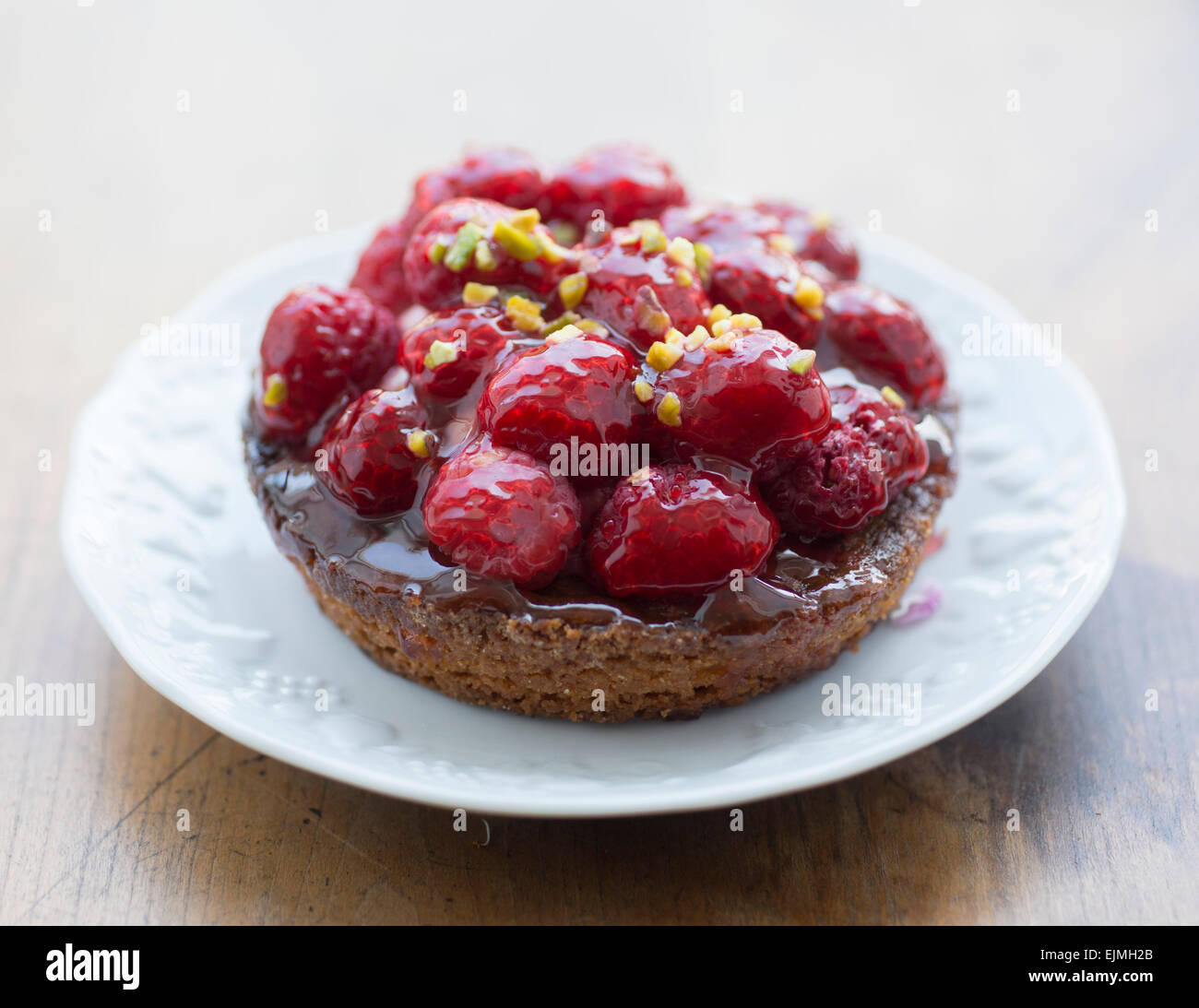 Raspberry tart from high end patisserie, Paris, France Stock Photo - Alamy