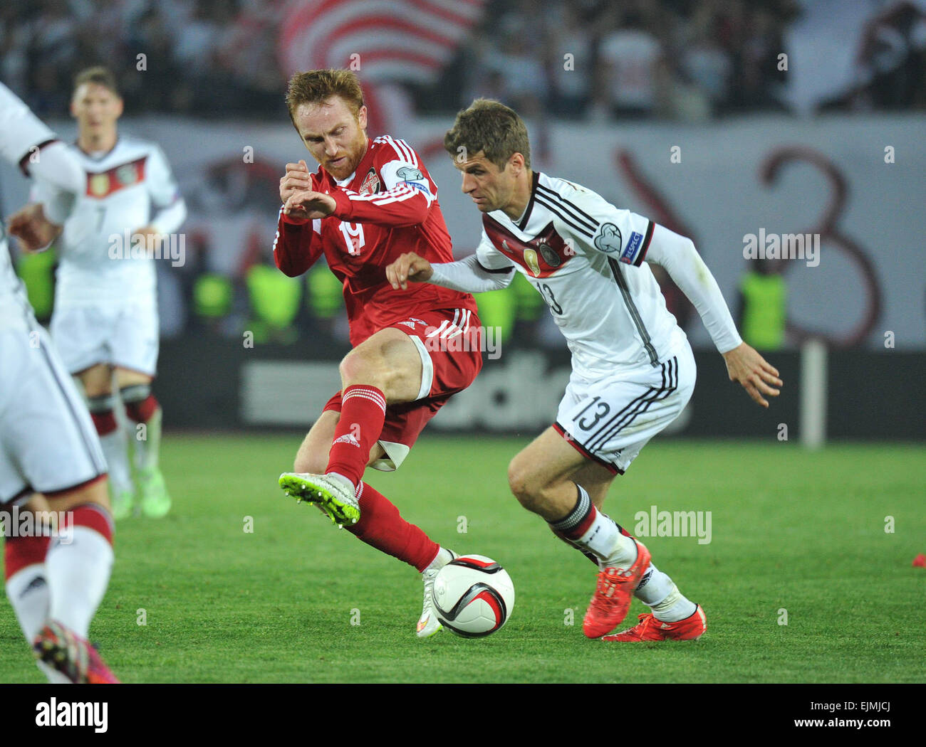 Tbilisi, Georgia. 29th Mar, 2015. Thomas Muller (R) of Germany vies ...