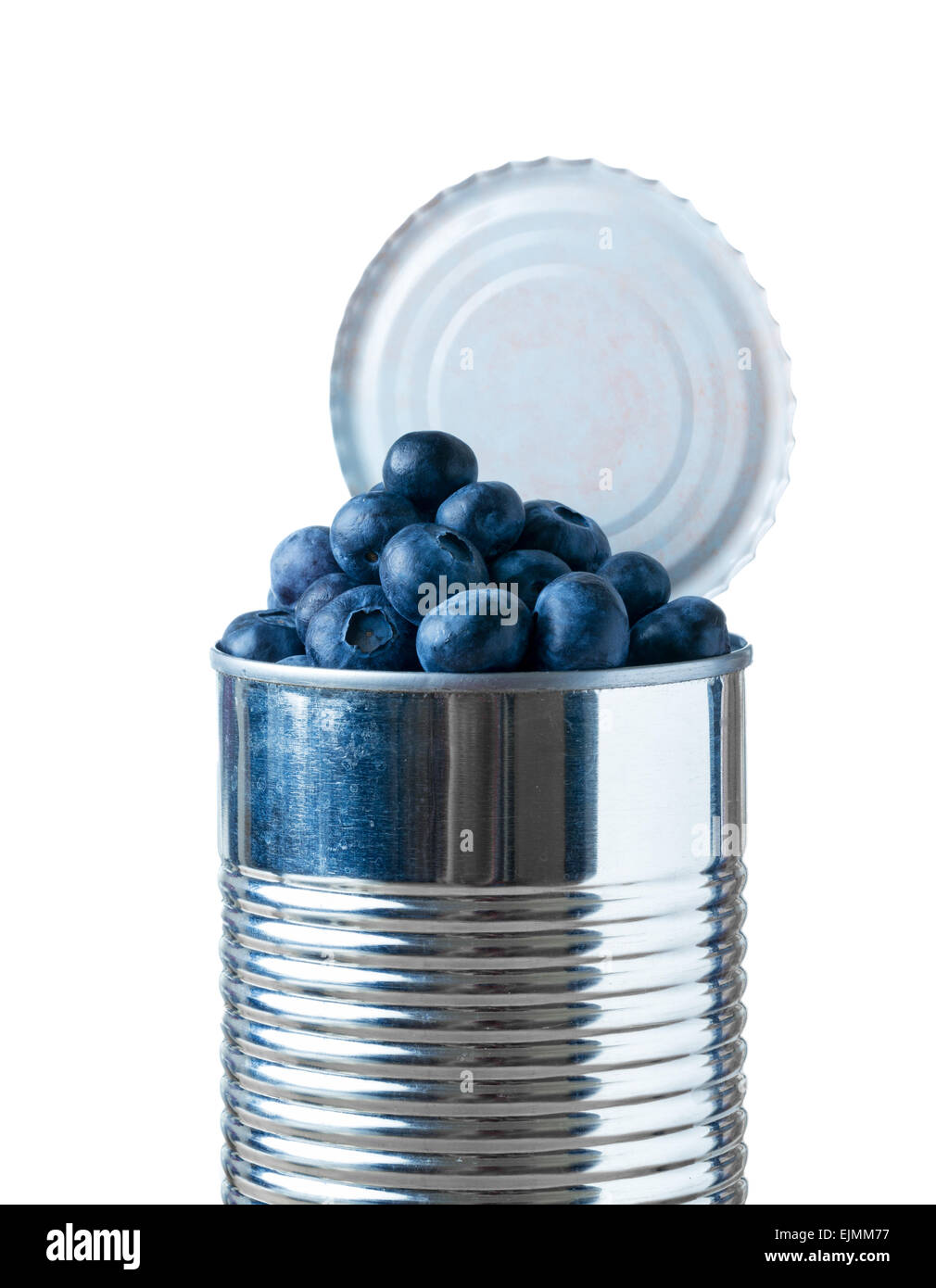 Blueberry fruit heaped inside opened tin can container in concept of ...