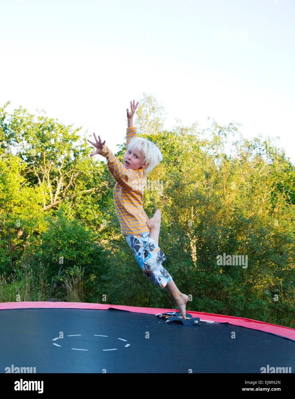 A jumping boy Stock Photo - Alamy