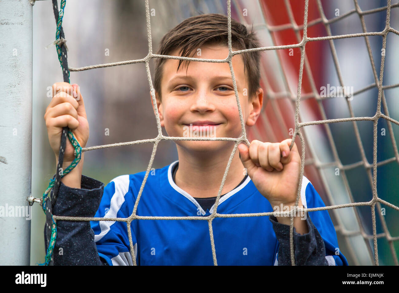 Boy sad football hi-res stock photography and images - Alamy