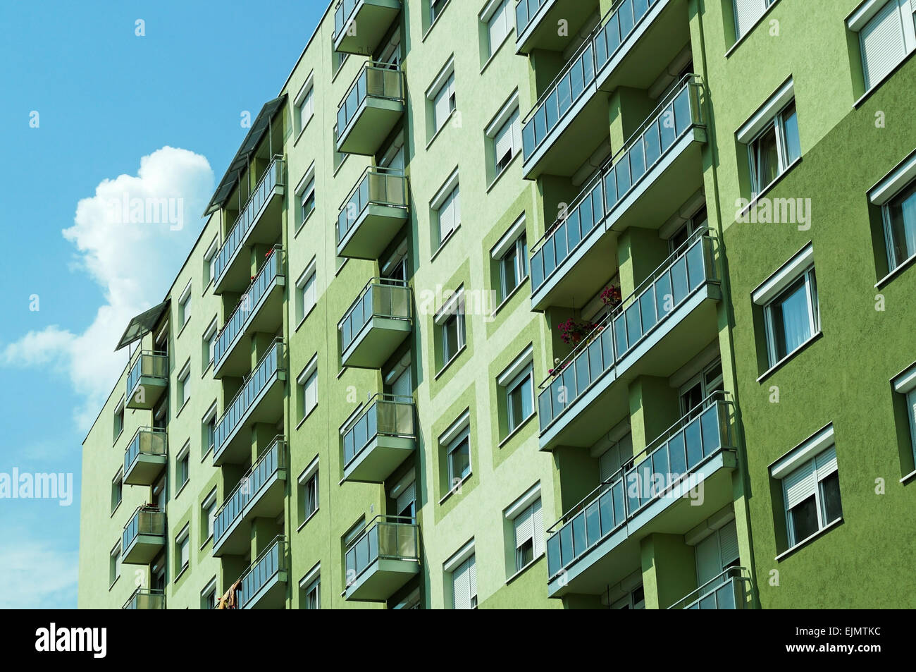 Green apartment house Stock Photo - Alamy