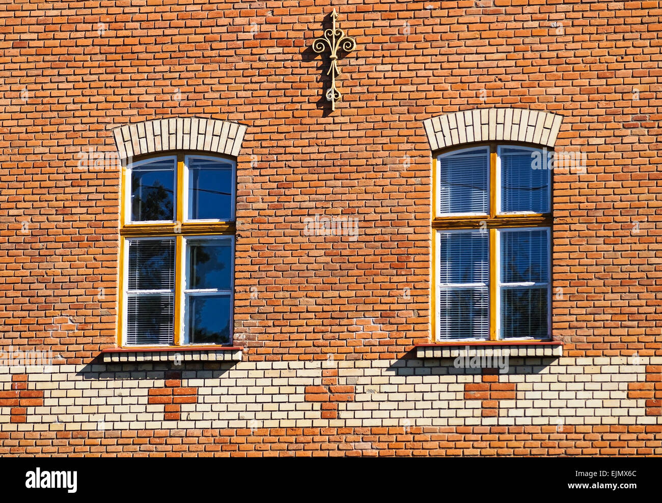Windows of an old brick building Stock Photo - Alamy
