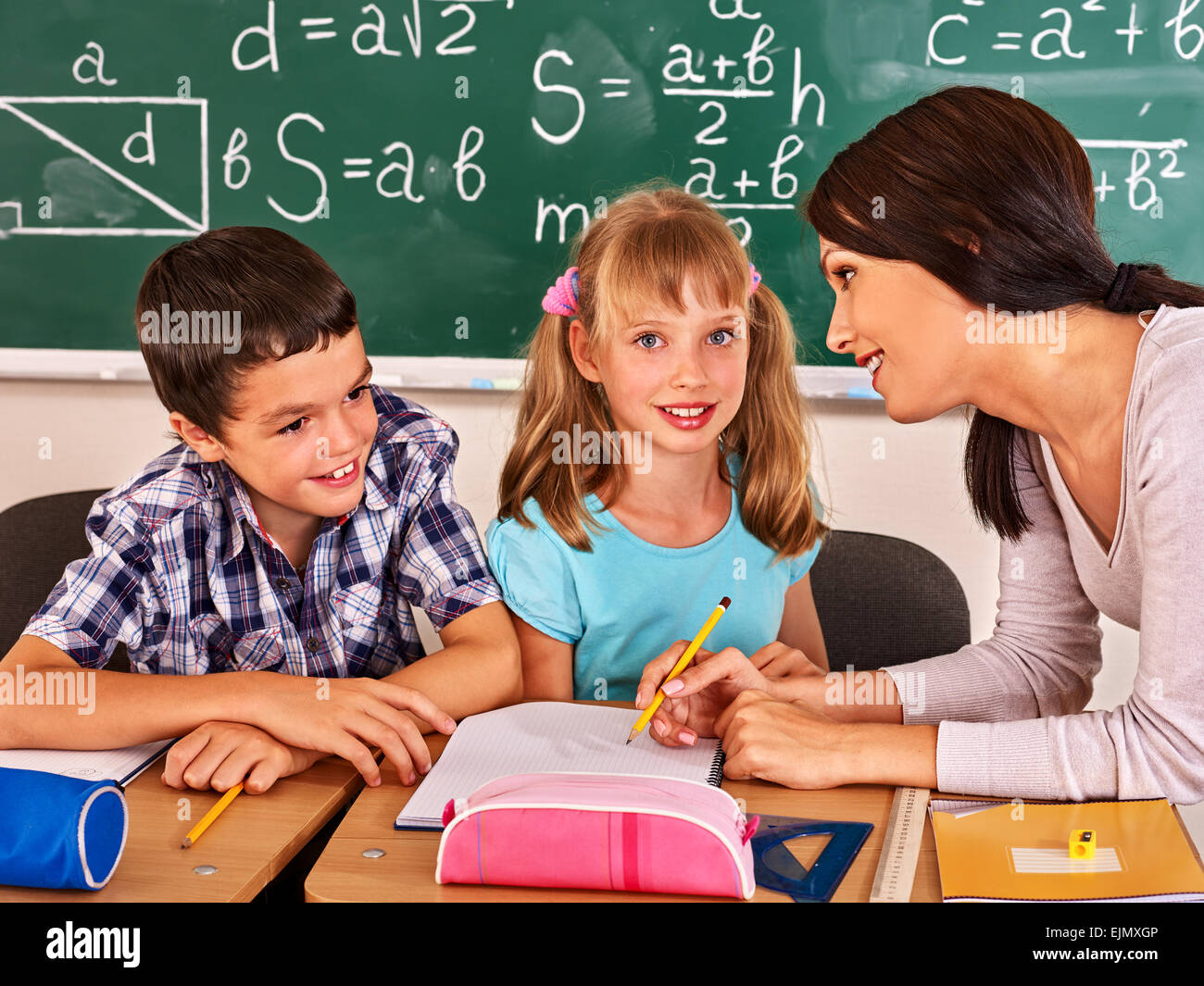 School child sitting in classroom Stock Photo - Alamy